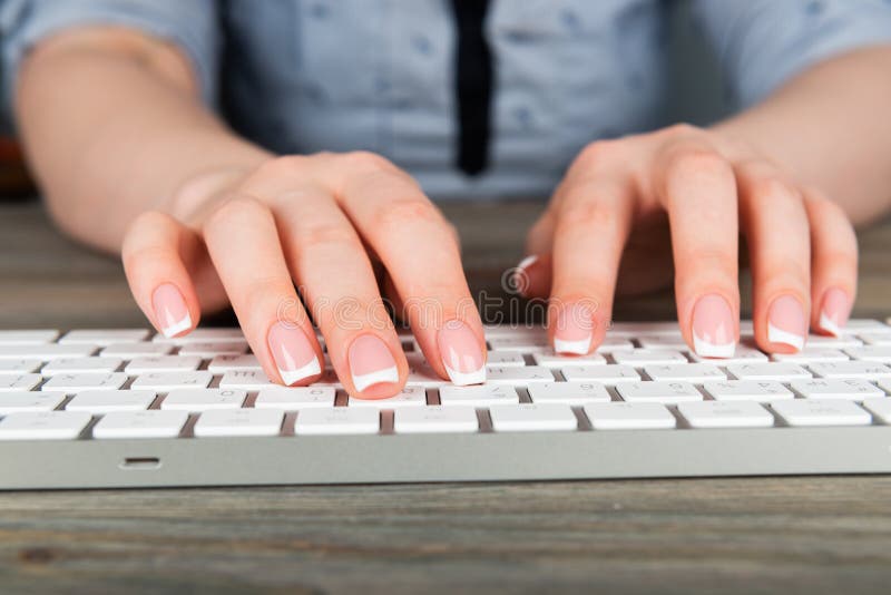 Female Office Worker Typing on Keyboard Stock Image - Image of focus ...