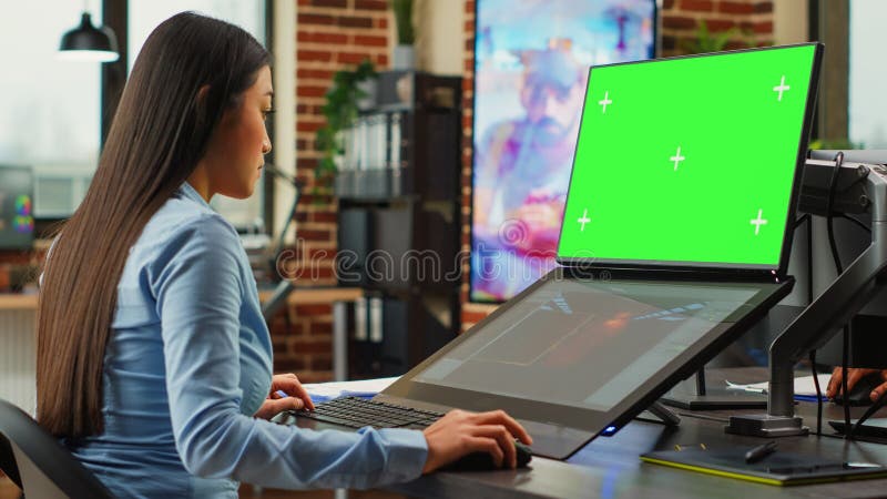 Female Office Worker Using Game Developing Interface and Greenscreen ...