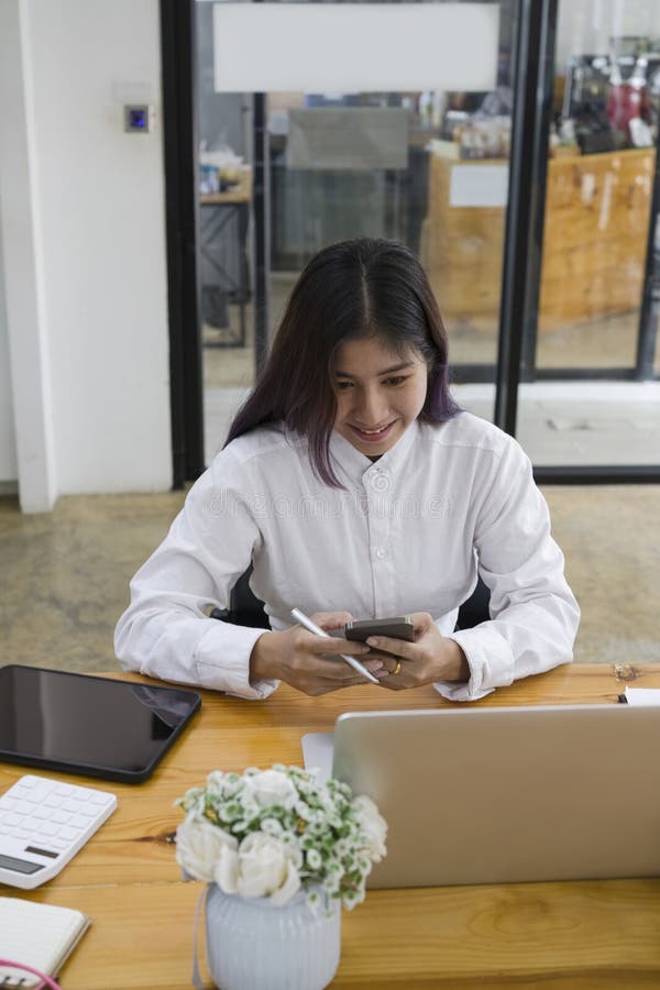 Office Worker Using Mobile Phone at Office Desk. Stock Photo - Image of ...
