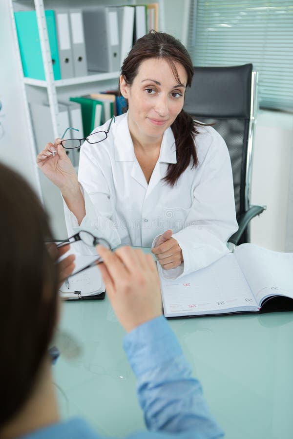 Female Ophthalmologist with Glasses on White Background Stock Image ...