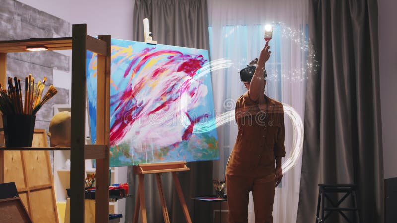 Female Painter Using Virtual Reality Headset Stock Footage - Video of ...