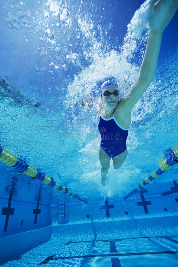 Female Participant Swimming Underwater Stock Photo - Image of blue ...