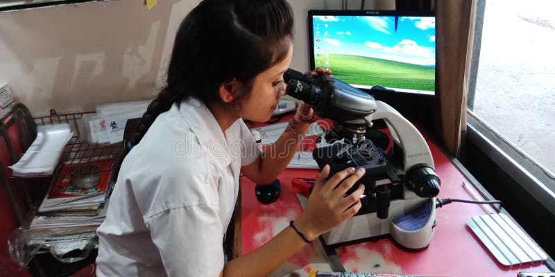 Female Pathologist Testing Samples from Horoscope at Laboratory in ...