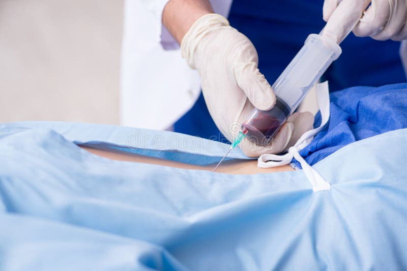 Female Patient Getting an Injection in the Clinic Stock Image - Image ...