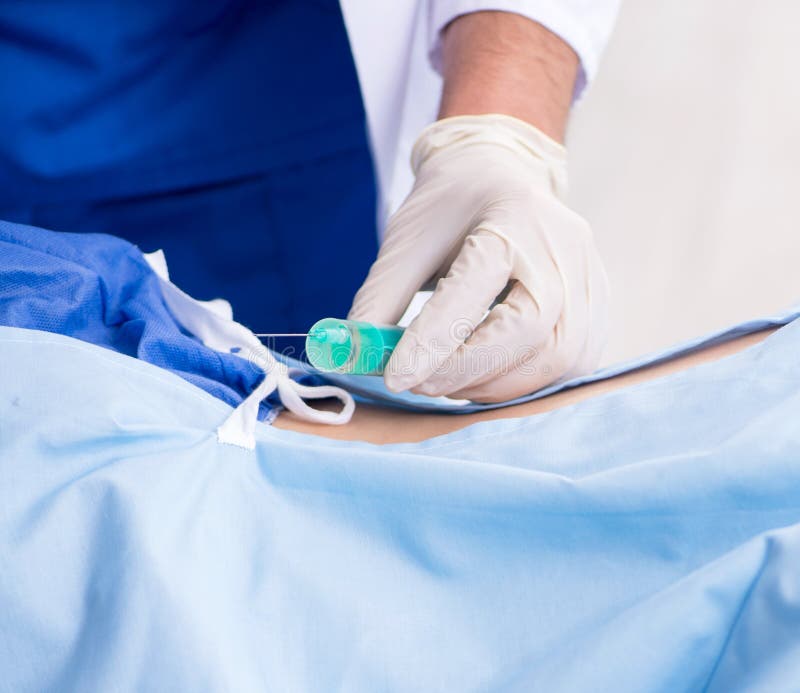 Female Patient Getting an Injection in the Clinic Stock Photo - Image ...
