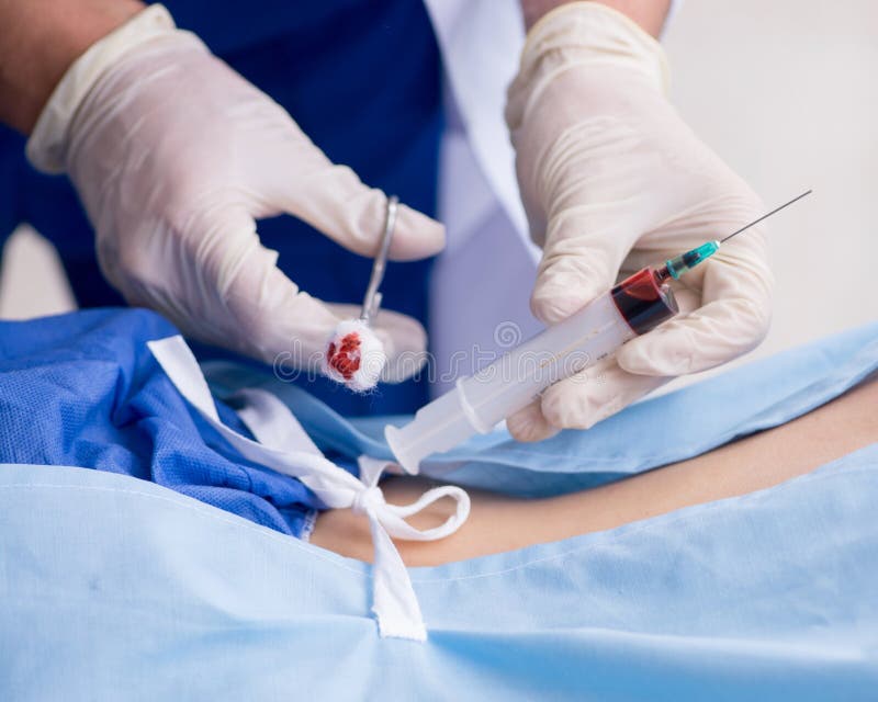Female Patient Getting an Injection in the Clinic Stock Image - Image ...