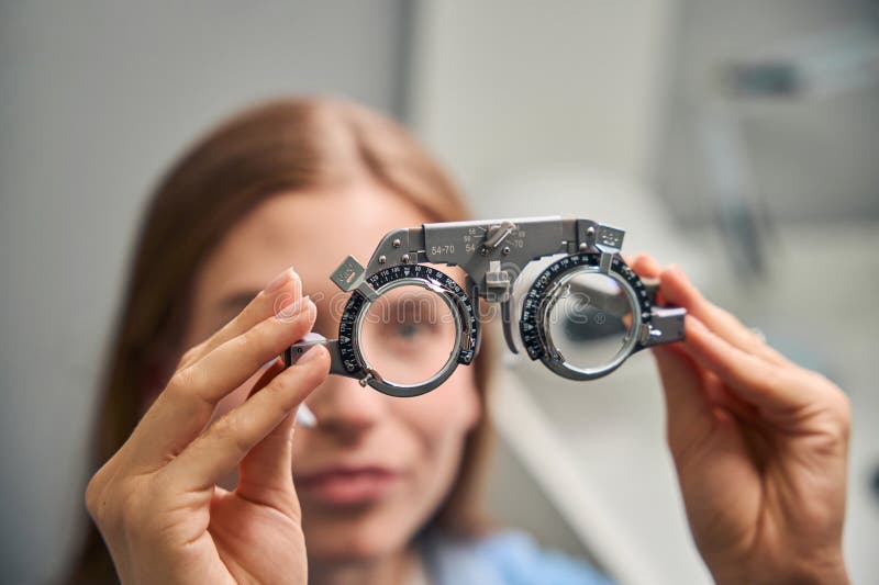 Female Patient Holding Trial Frame for Vision Testing Stock Image ...