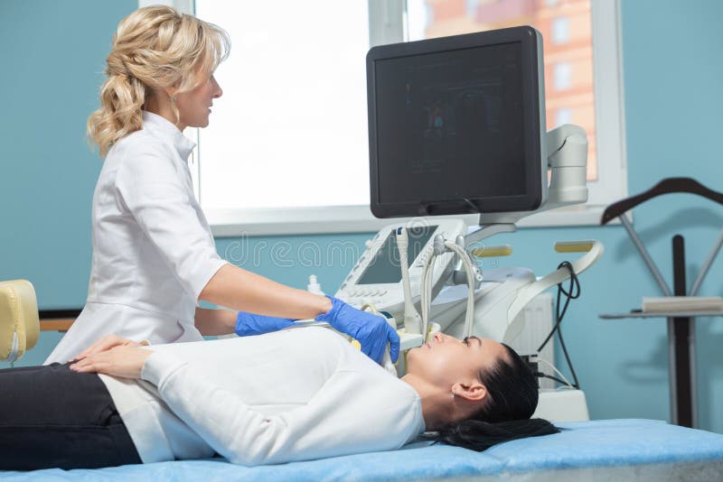 Female Patient Is Lying On A Couch During The Procedure Of Ultrasound