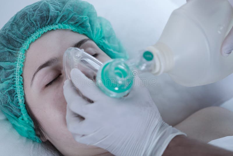 Female Patient with Oxygen Mask Stock Photo - Image of doctor, giving ...
