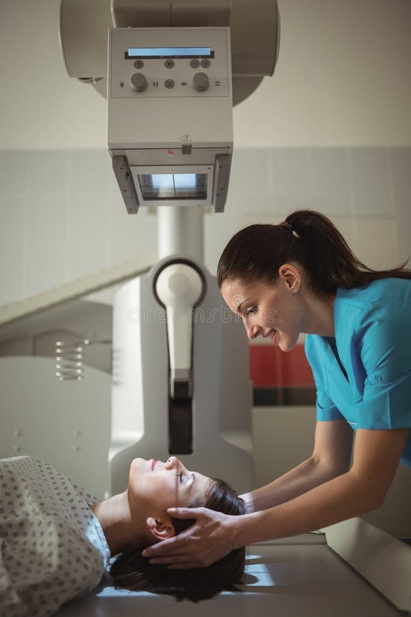 Female Patient Undergoing an X-ray Test Stock Photo - Image of patient ...