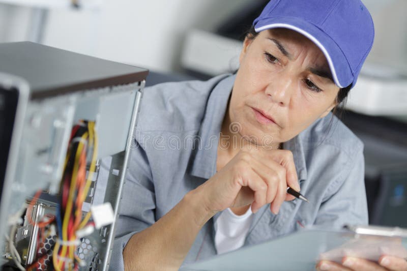 Female Pc Technician Fixing Pc Stock Image - Image of single, lifestyle ...