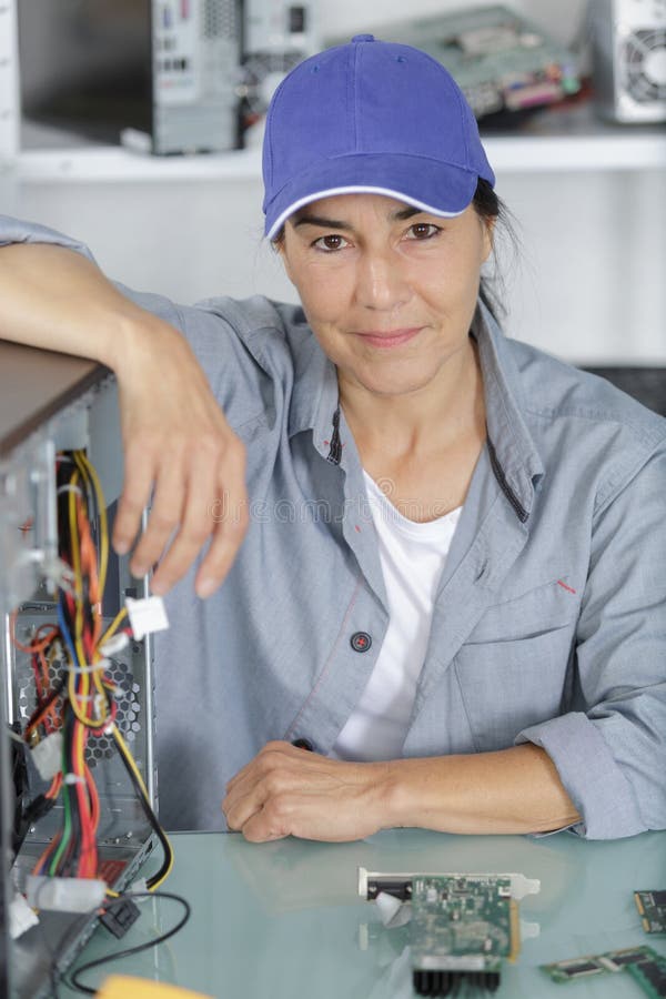 Female Pc Technician Posing by Computer Stock Photo - Image of posing ...