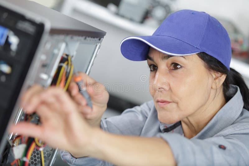 Female Pc Technician Soldering Chip from Desktop Computer Stock Photo ...
