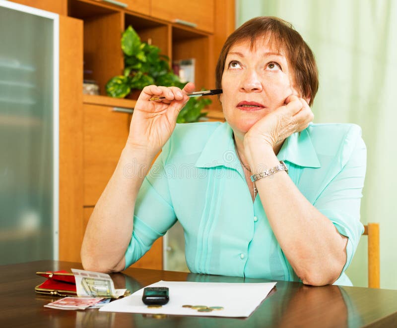 Female Pensioner Doing Financial Work Indoor Stock Image - Image of ...