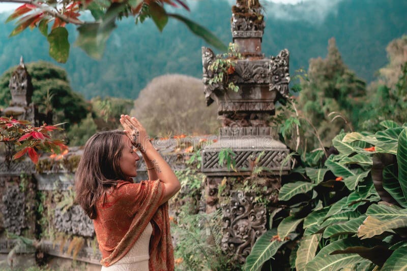 Female Performing Hindu Ritual in Ancient Bali Temple Stock Photo ...