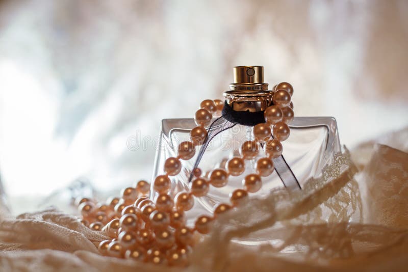 Female perfume with pearls stock photo. Image of glass - 105077876