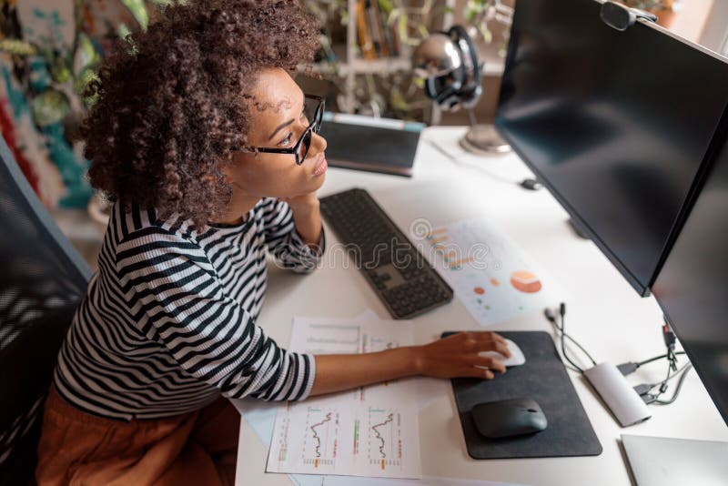 Multiethnic Woman Working on Computer in Office Stock Photo - Image of ...