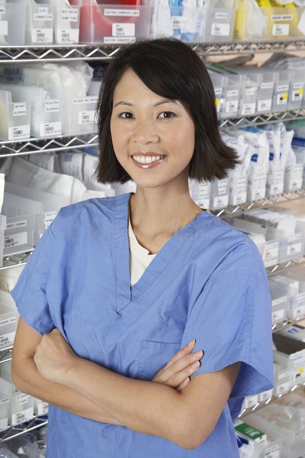 Female Pharmacist at Pharmacy Stock Photo - Image of crossed ...