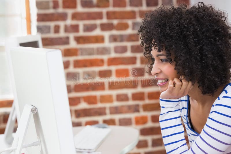 Female Photo Editor Using Computer in Office Stock Photo - Image of ...