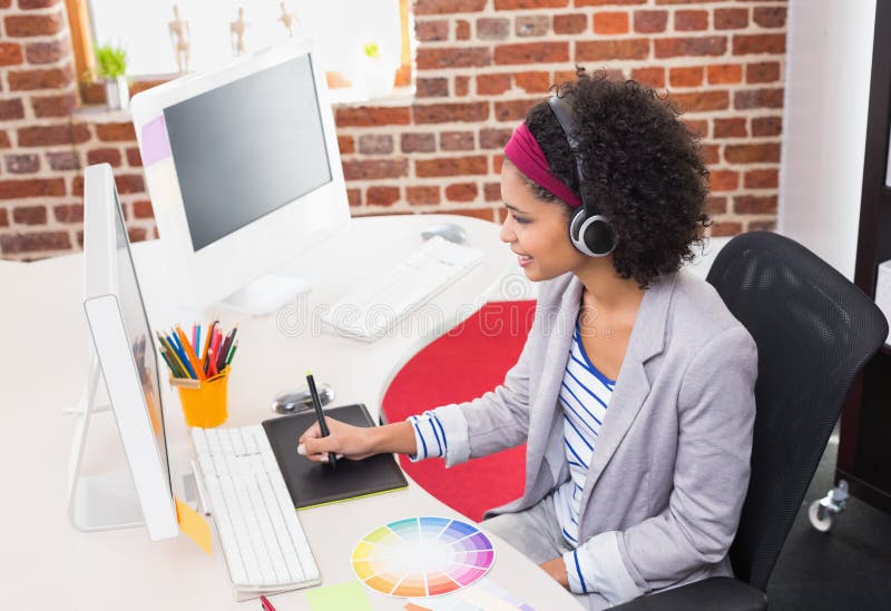 Female Photo Editor Using Digitizer in Office Stock Photo - Image of ...