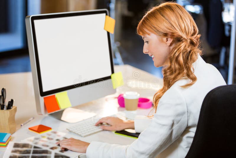 Female Photo Editor Working at Computer Desk Stock Image - Image of ...