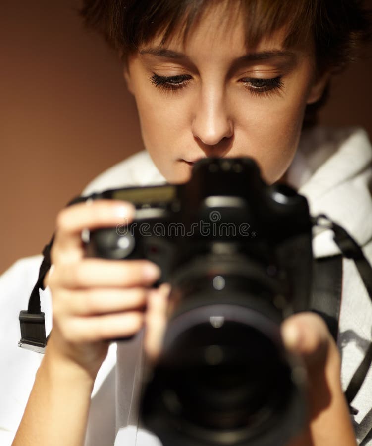 Female photographer stock image. Image of person, lens - 19224011