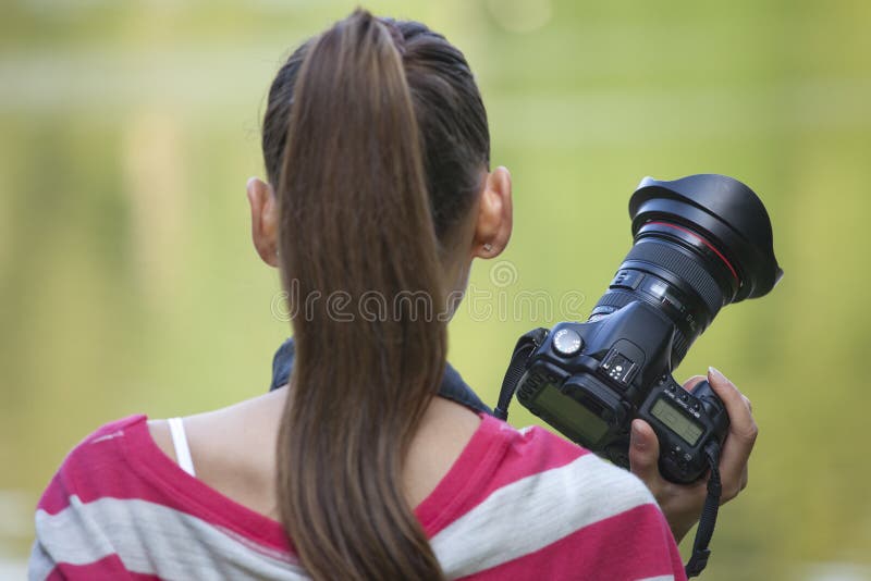 Female Photographer with Camera Stock Image - Image of female, working ...