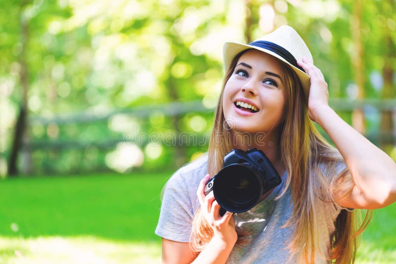 Female Photographer with a Camera Outside Stock Image - Image of ...