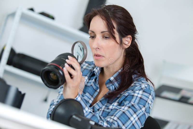 Female Photographer with Magnifying Glass Stock Image - Image of ...