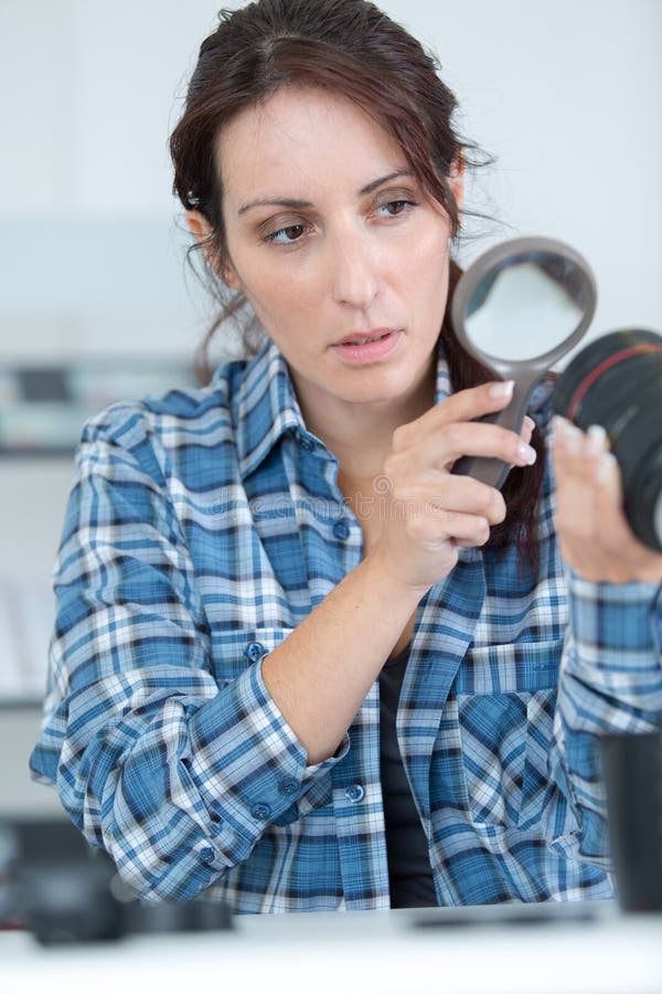 Female Photographer Using Magnifying Glass Stock Image - Image of adult ...