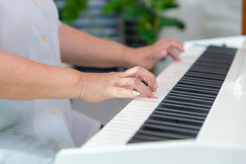 Female Pianist Hands on Grand Piano Keyboard Stock Image - Image of ...