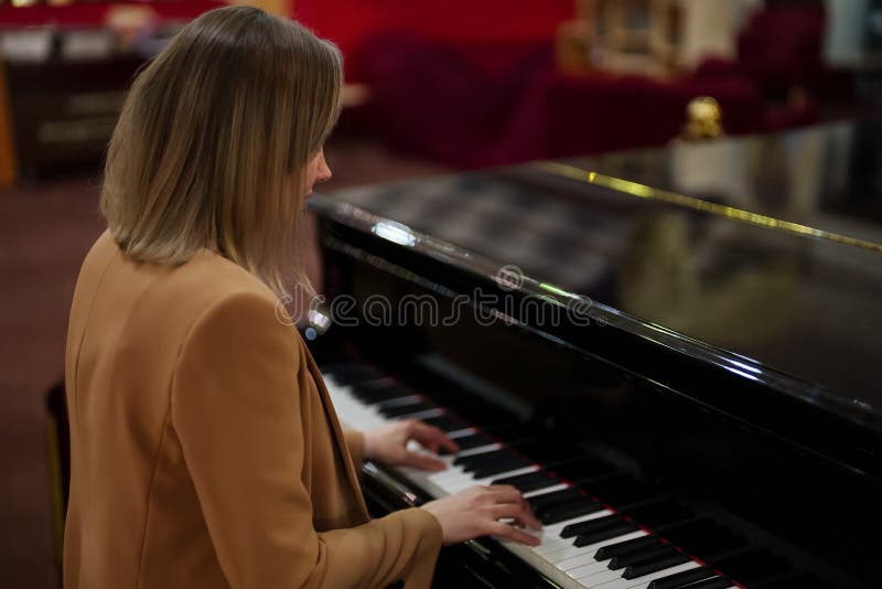 Female Pianist Plays the Piano Stock Photo - Image of melody, piano ...