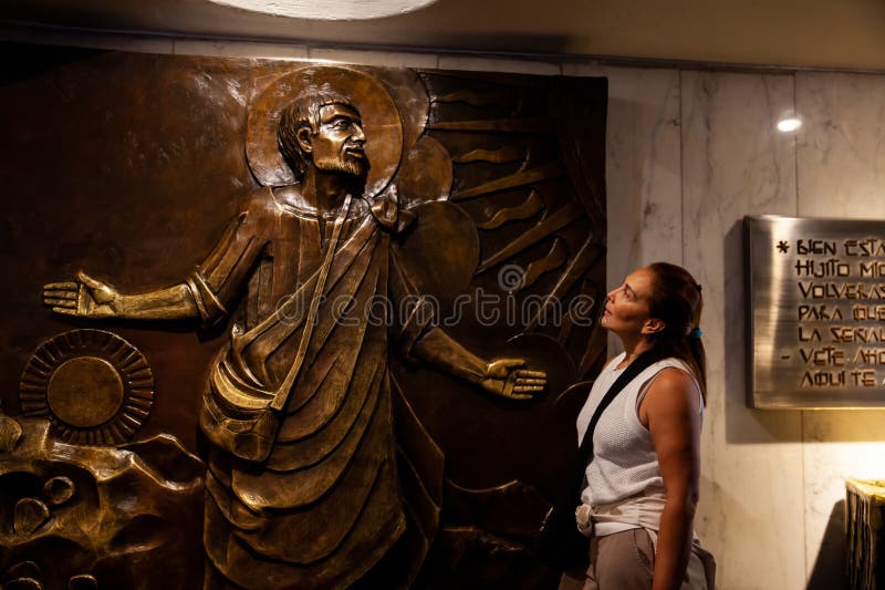 Female Pilgrim Looking at the High Relief of the Saint San Juan Diego ... Female Pilgrim Looking at the High Relief of the Saint San Juan Diego ...