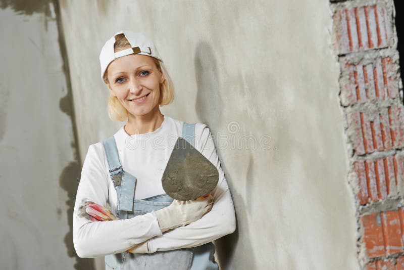 Female plasterer portrait stock photo. Image of plasterer - 44645324
