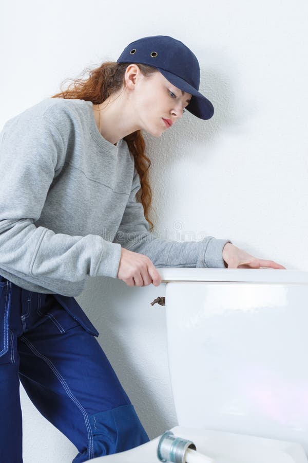 104 Female Fixing Toilet Stock Photos - Free & Royalty-Free Stock ...