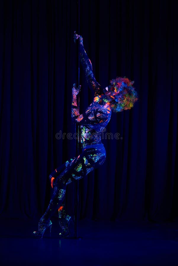 Female Pole Dancer in Bright Neon Colours Under Ultraviolet Stock Photo ...