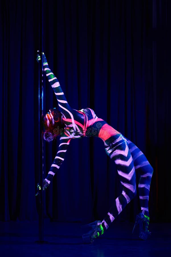 Female Pole Dancer in Bright Neon Colours Under Ultraviolet Stock Photo ...