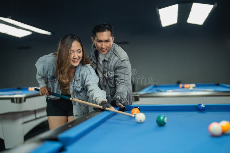 Female Pool Player Guided by the Male Pool Player Stock Photo - Image ...