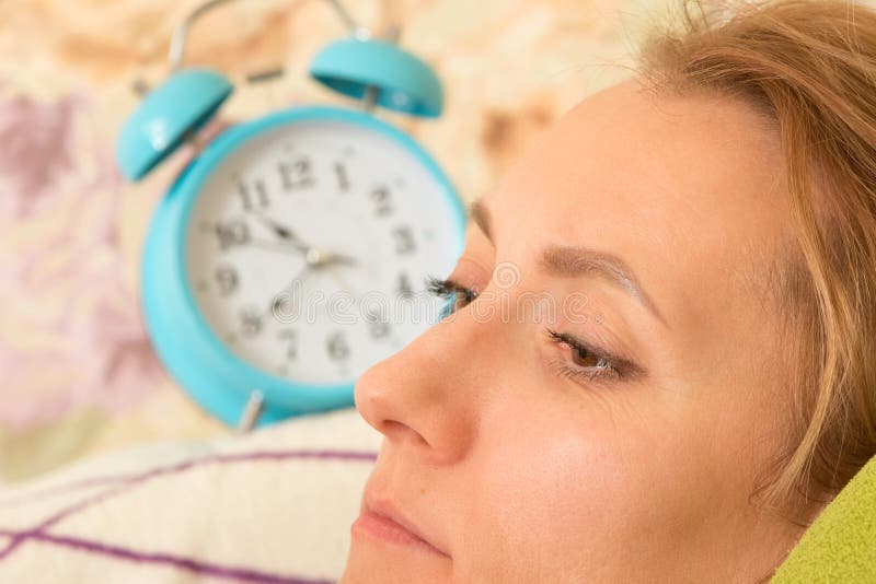 Female Portrait with Alarm Clock. Stock Photo - Image of bedroom, girl ...