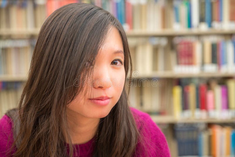 Female Portrait in Library stock photo. Image of oriental - 34765856