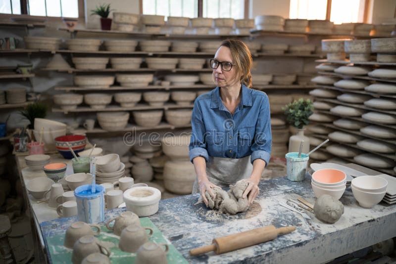 Female Potter Molding a Clay Stock Photo - Image of manual, casual ...