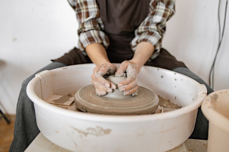 Female Potter Sculpting Ceramic Dish Using's Wheel Stock Photos - Free ...