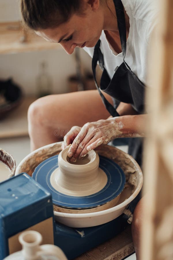 Female Pottery Master at Work in Her Clay Studio, Young Entrepreneur ... Female Pottery Master at Work in Her Clay Studio, Young Entrepreneur ...