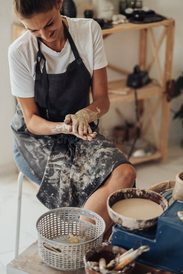 Female Pottery Master at Work in Her Clay Studio, Young Entrepreneur ... Female Pottery Master at Work in Her Clay Studio, Young Entrepreneur ...