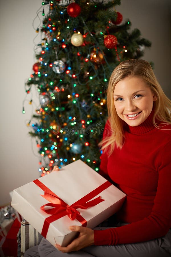 Female with present stock photo. Image of holiday, event - 35658096