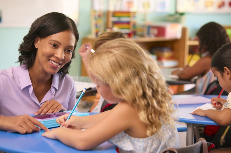 Female Primary or Elementary School Teacher in Multi-Cultural Class ...