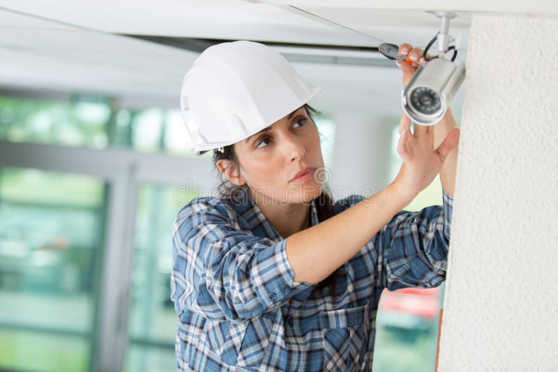 Female Professional Cctv Technician Working Stock Image - Image of ...