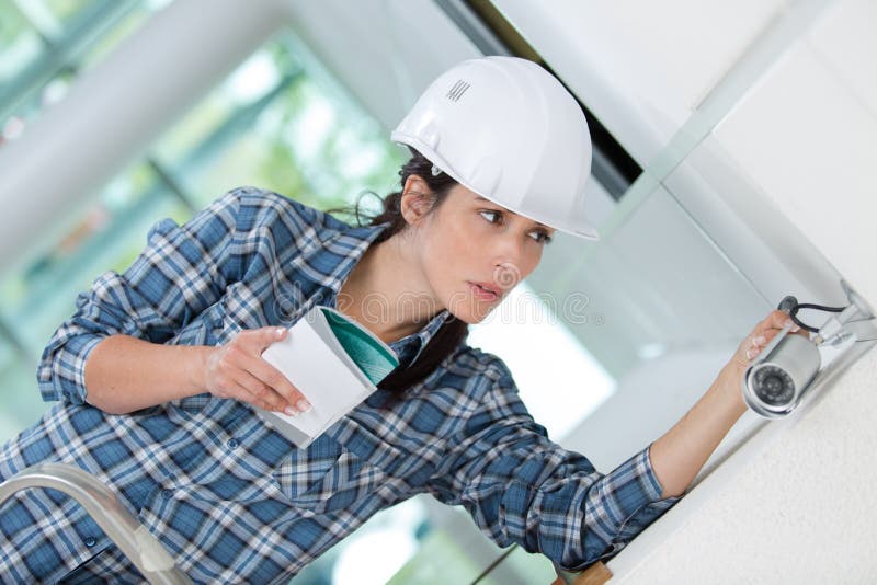 Female Professional Cctv Technician Working Stock Photo - Image of ...
