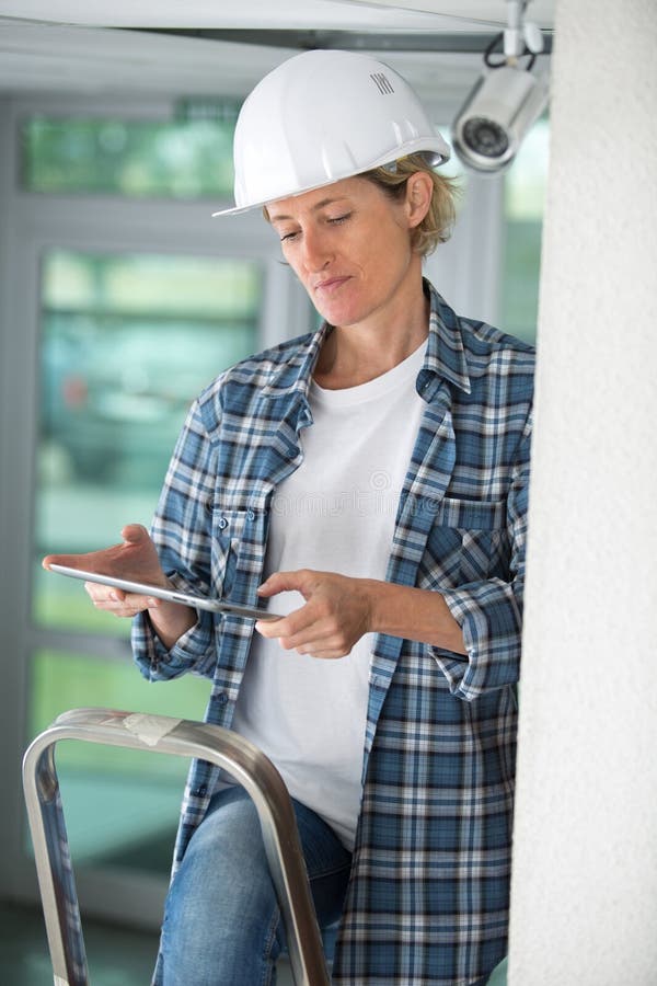 Female Professional Cctv Technician Working Stock Photo - Image of ...