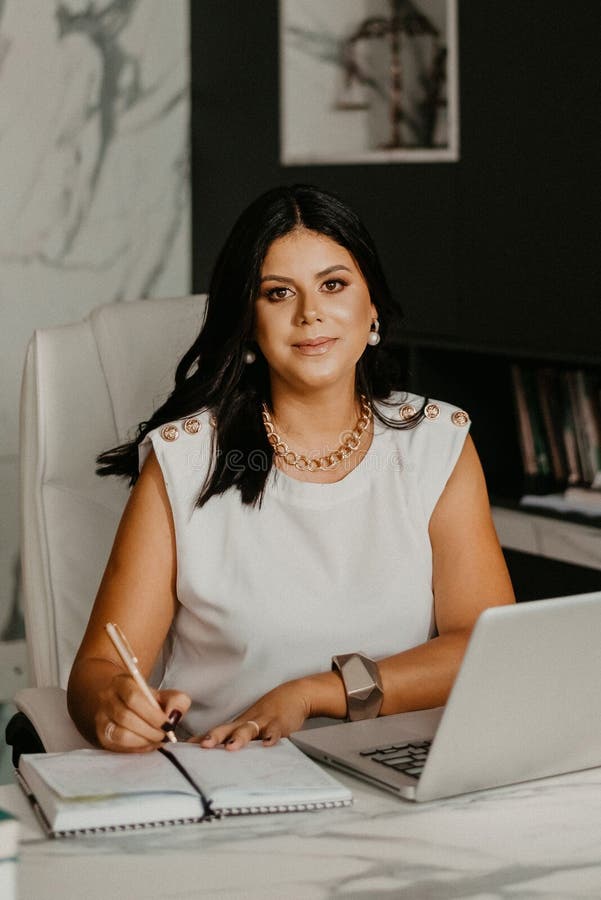 Female Professional at Her Home Office, Smiling with Contentment Stock ...